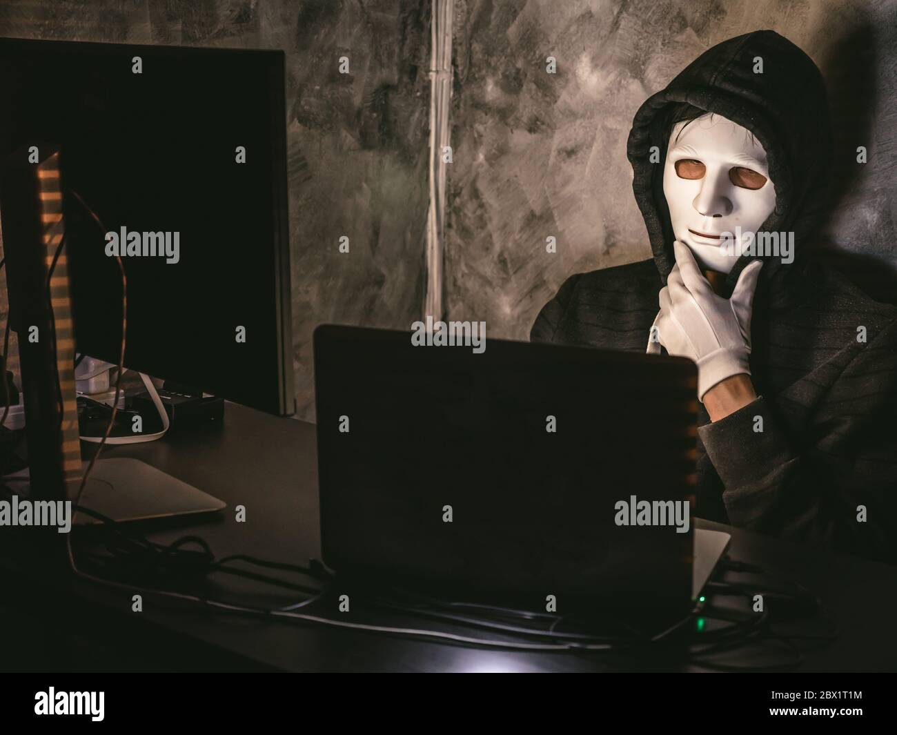 Computer hacker - Man in hoodie shirt with mask stealing data from ...