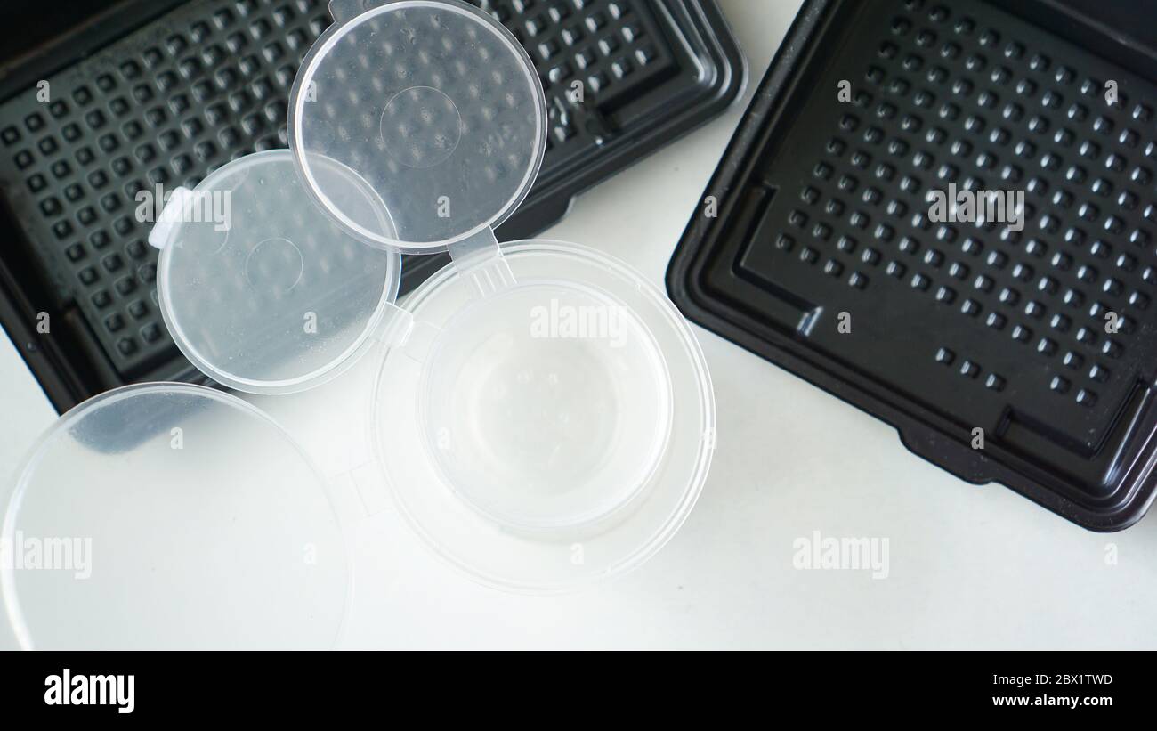 Empty plastic containers for sushi set delivery. Take away lunch box ...