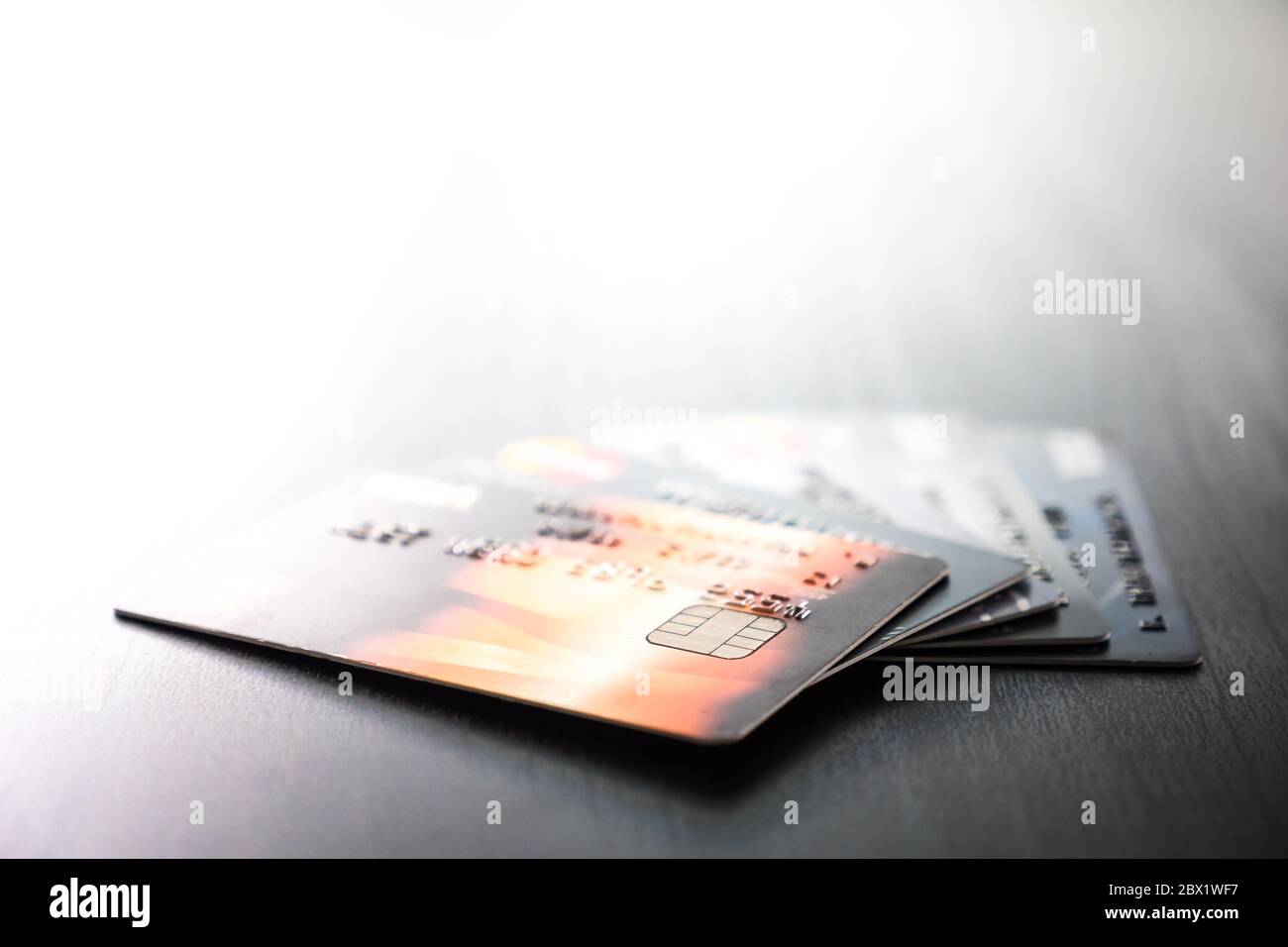 Credit cards on the table, soft focus, flare sun light, Online shopping ...