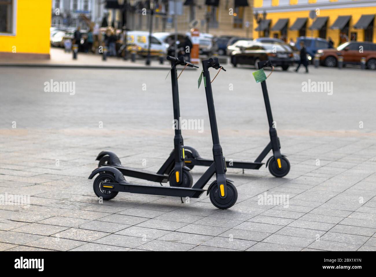 Modern black electric scooters parked outside outdoors for self use ...