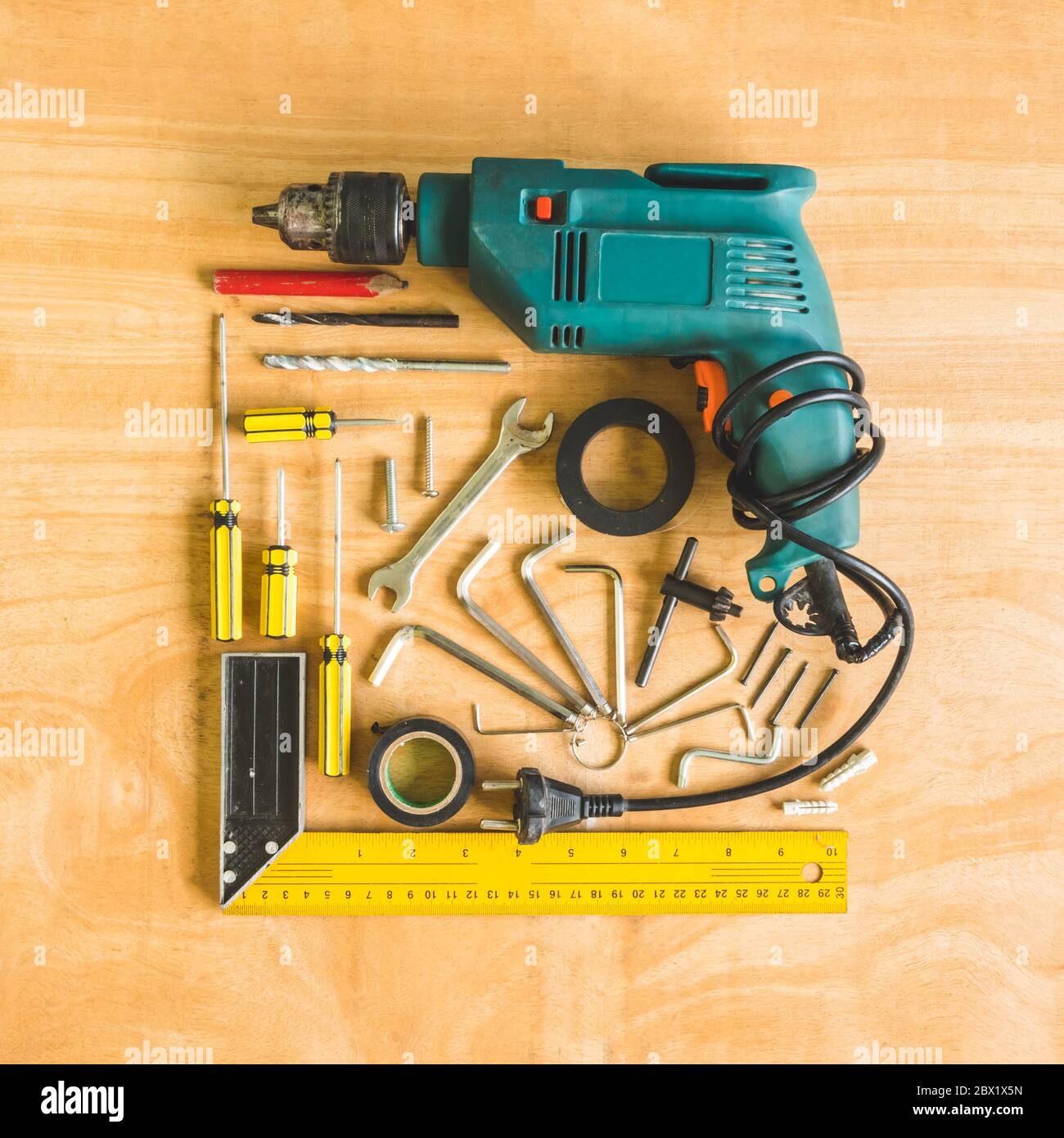 Set of different work tools on wooden table background Stock Photo - Alamy