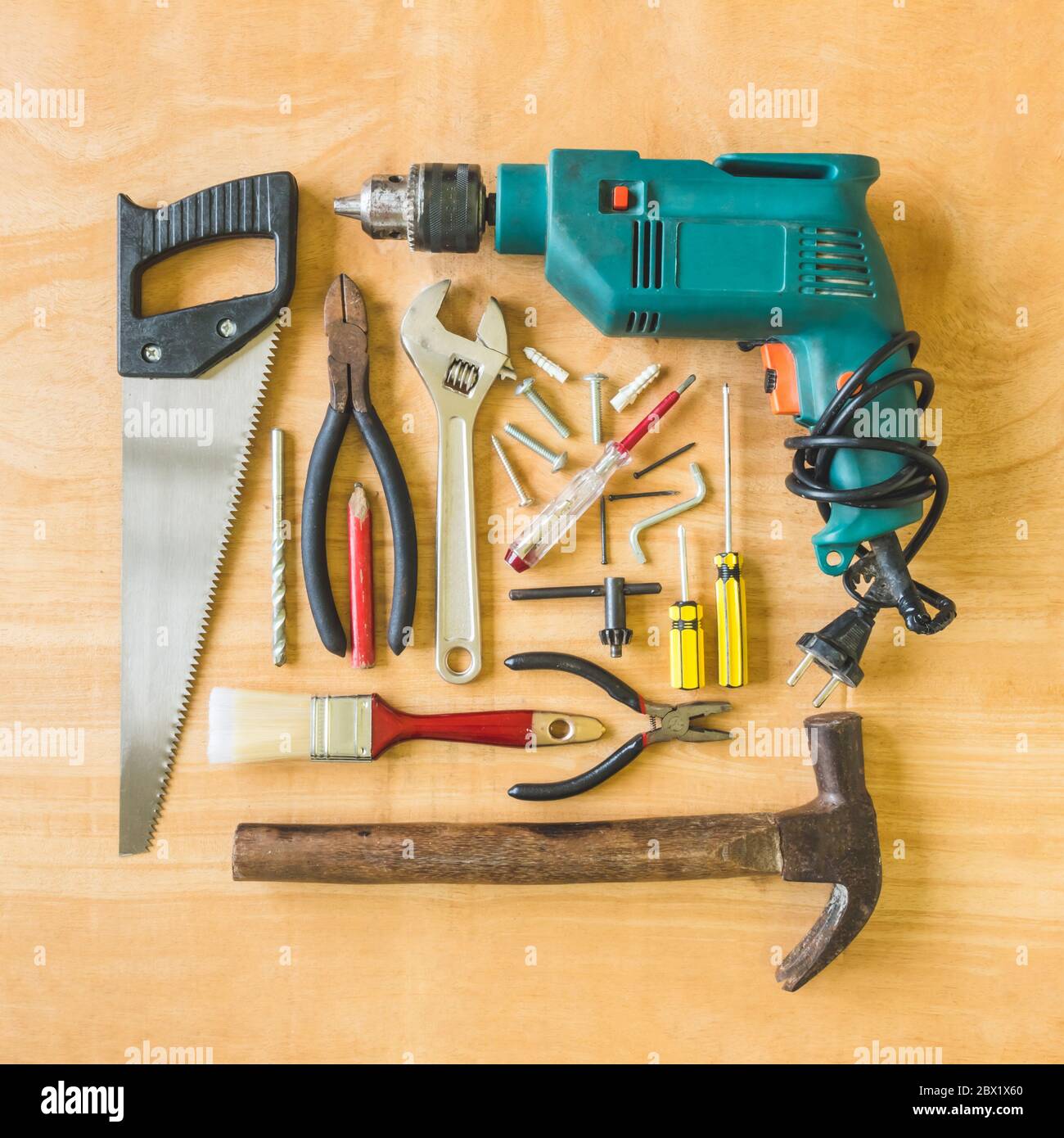 Set of different work tools on wooden table background Stock Photo - Alamy