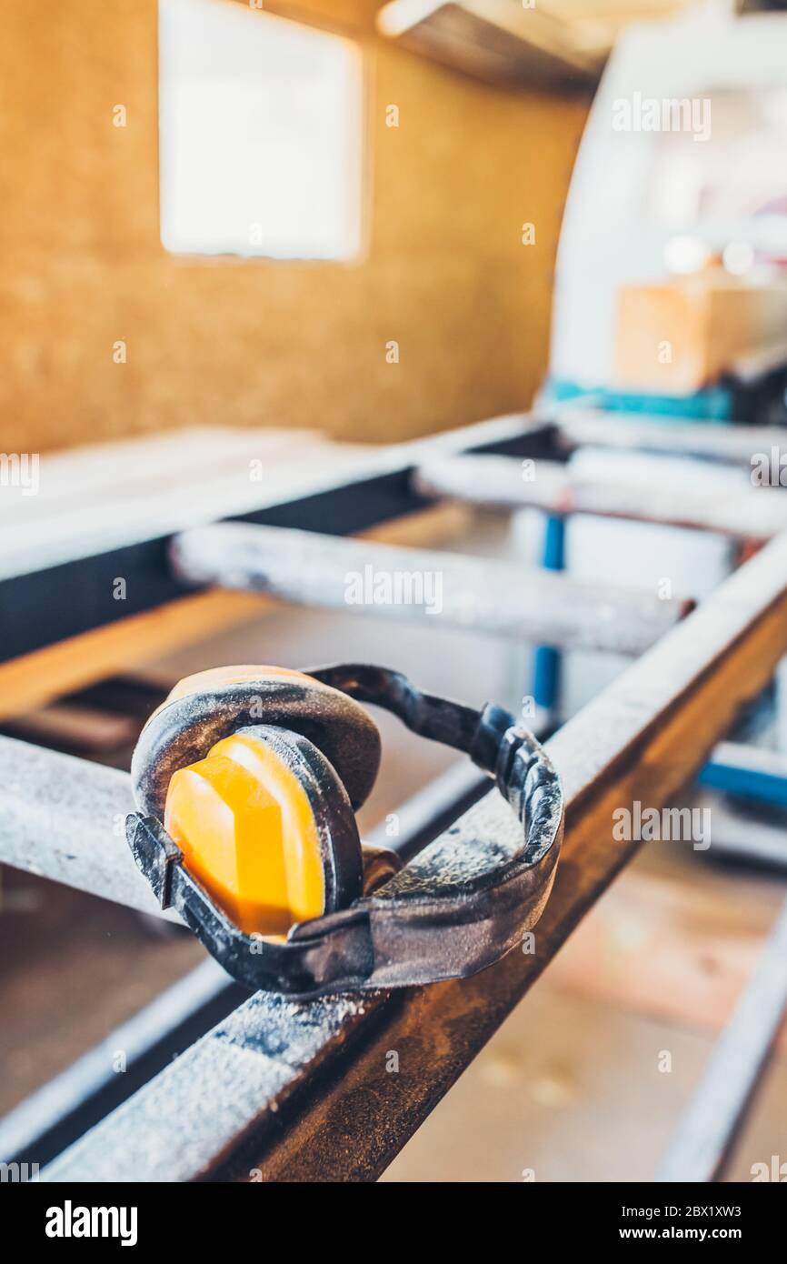 Headphones for hearing protection in heavy production among noisy ...