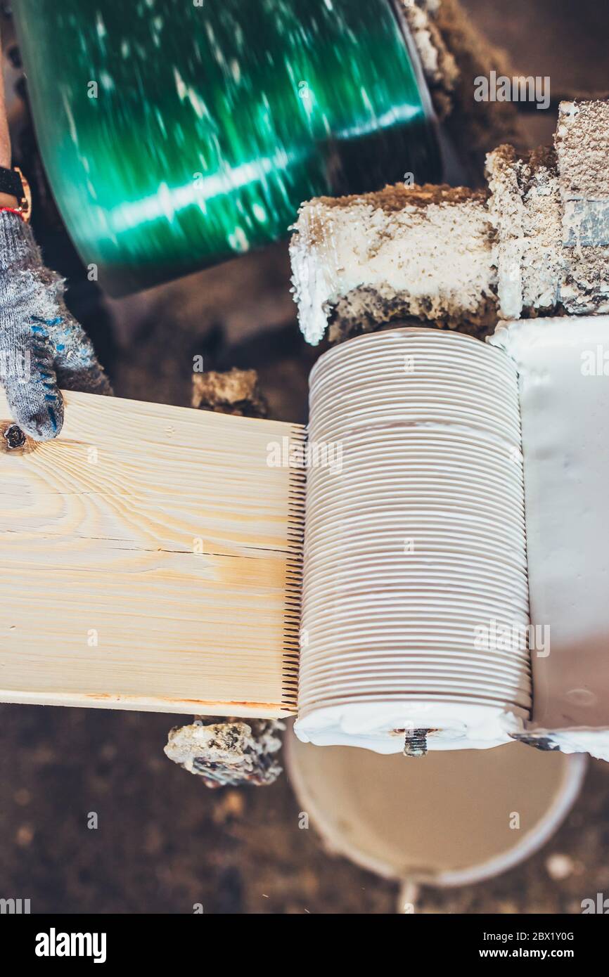 Wood processing at the sawmill - woodworking industry - gluing Stock ...