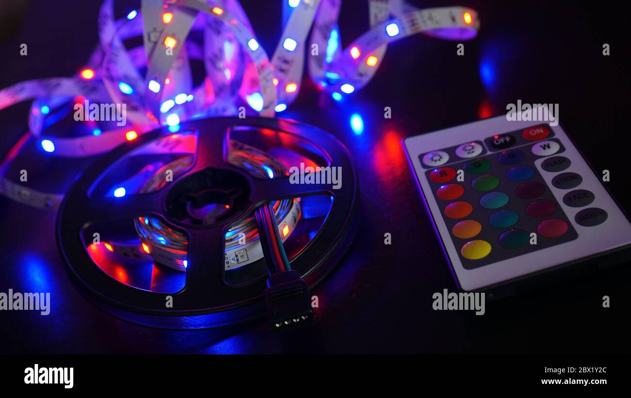 LED strip in purple colors and a control panel for switching colors ...