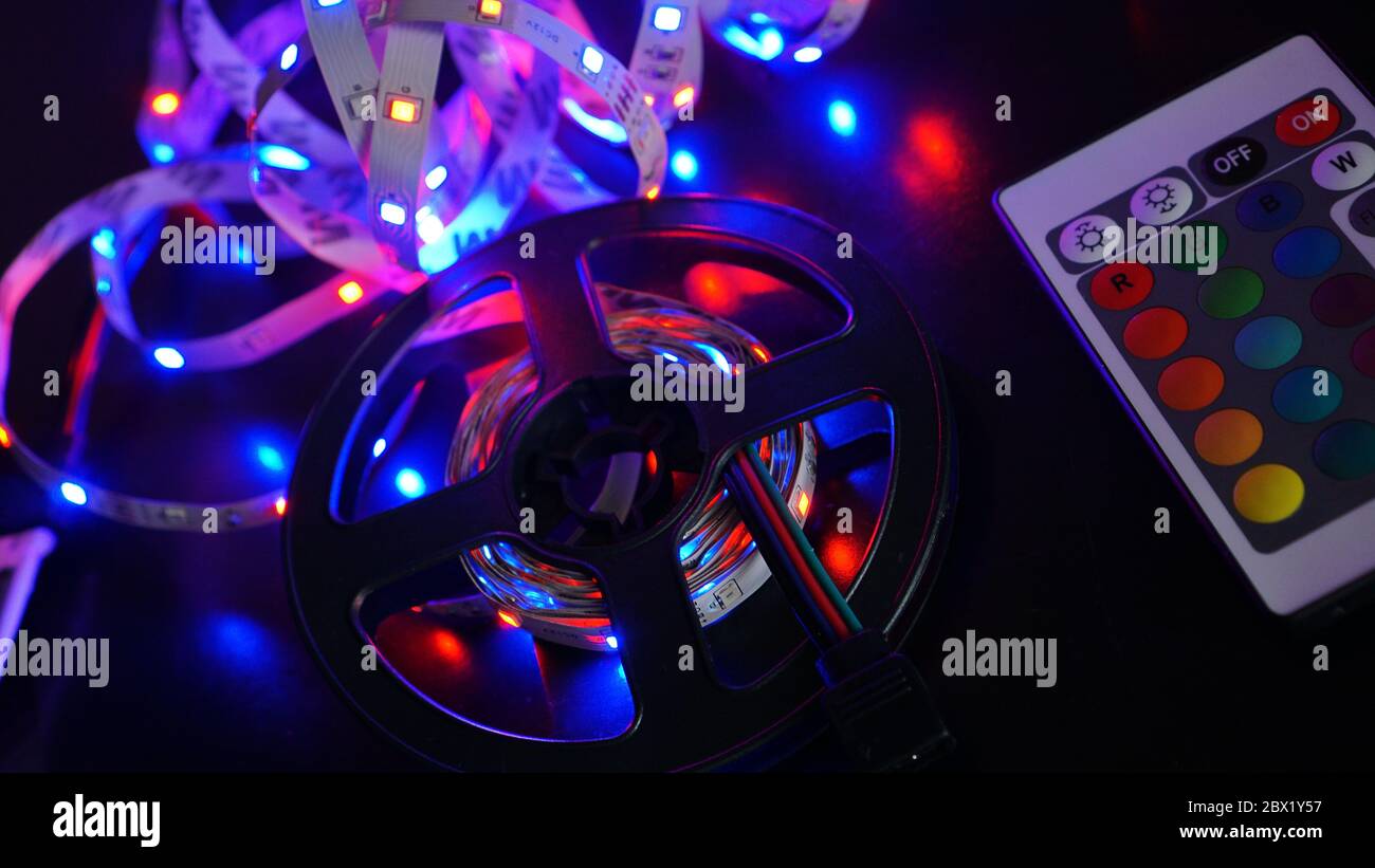 LED strip in purple colors and a control panel for switching colors ...
