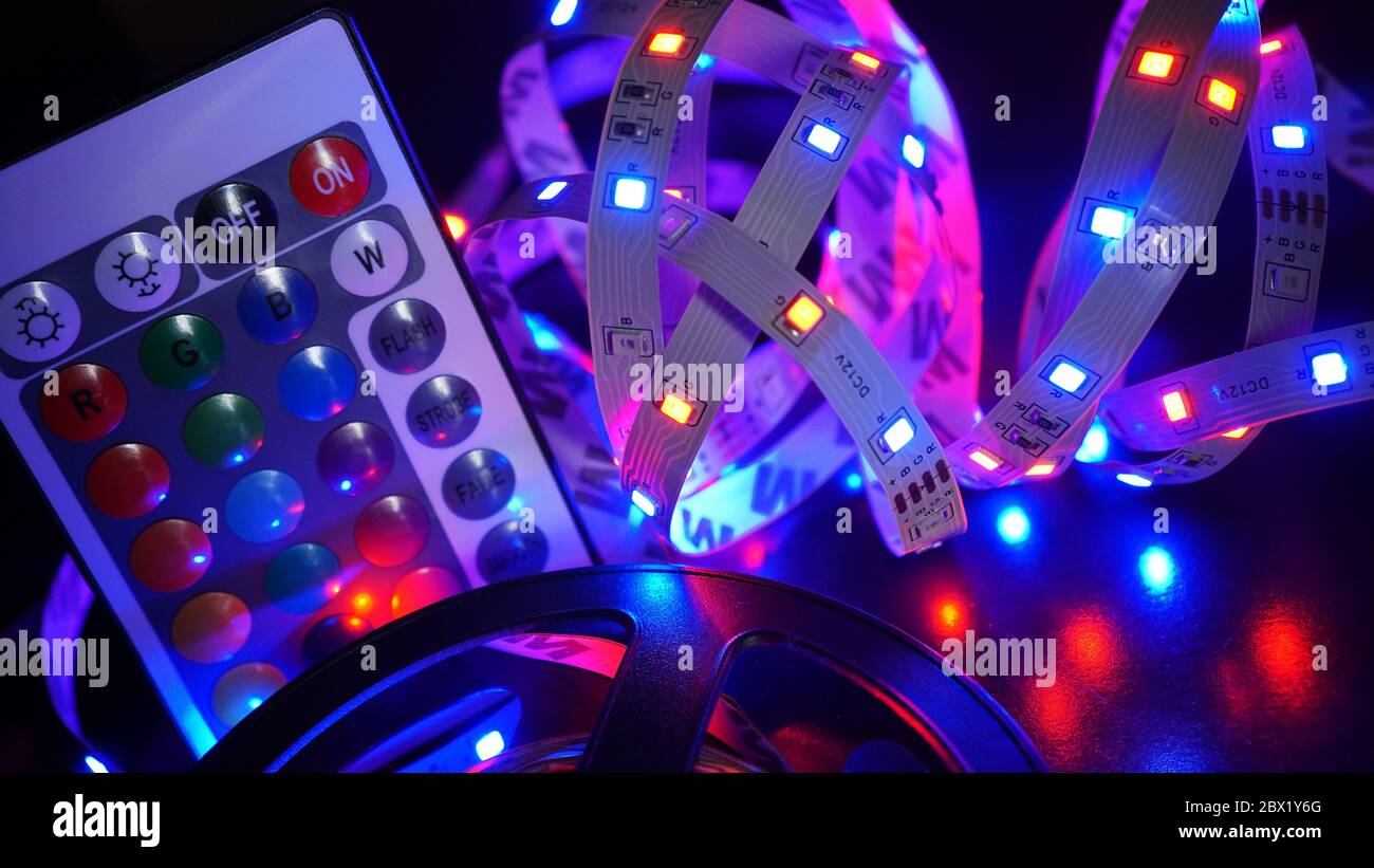 LED strip in purple colors and a control panel for switching colors ...