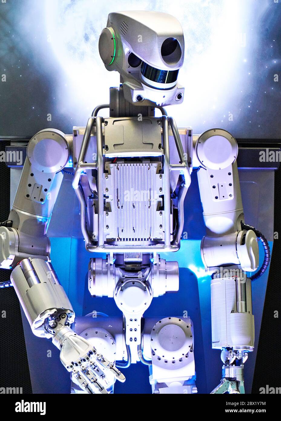 Metal robot in space background Stock Photo - Alamy