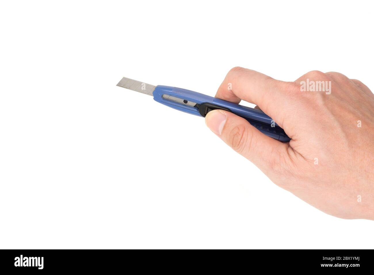 Hand holding cutter knife on white background Stock Photo - Alamy