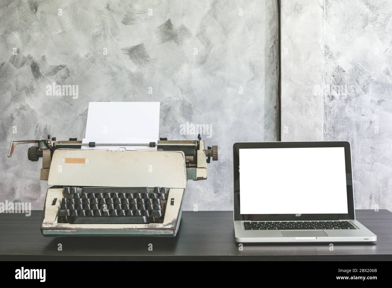 Old Typewriter and Laptop on the desk Stock Photo - Alamy