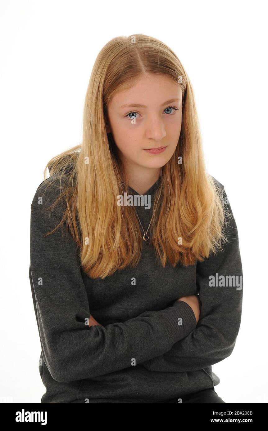 pretty blonde moody teenage girl isolated on white background Stock ...