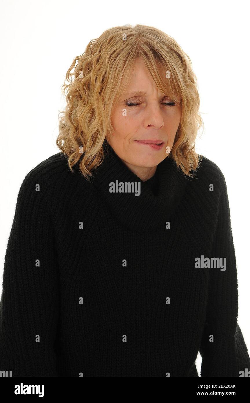 pretty blonde woman looking worried, isolated on white background Stock ...