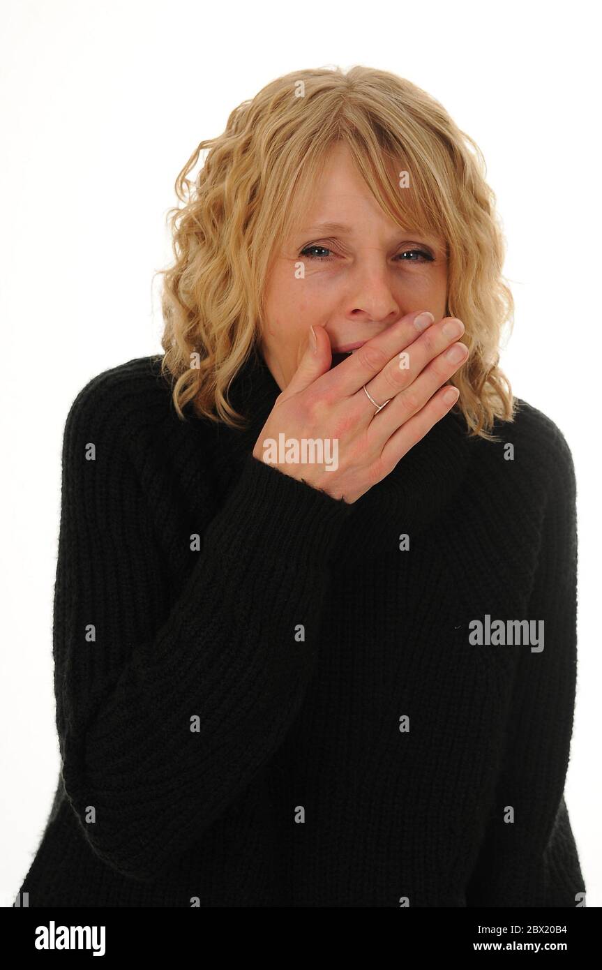pretty blonde woman yawning, isolated on white background Stock Photo ...