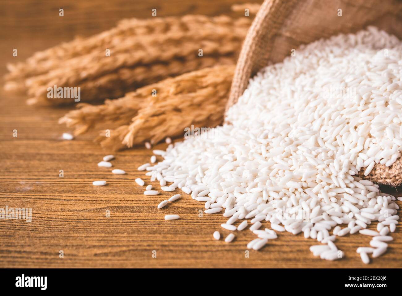 Rice in burlap sack hi-res stock photography and images - Alamy
