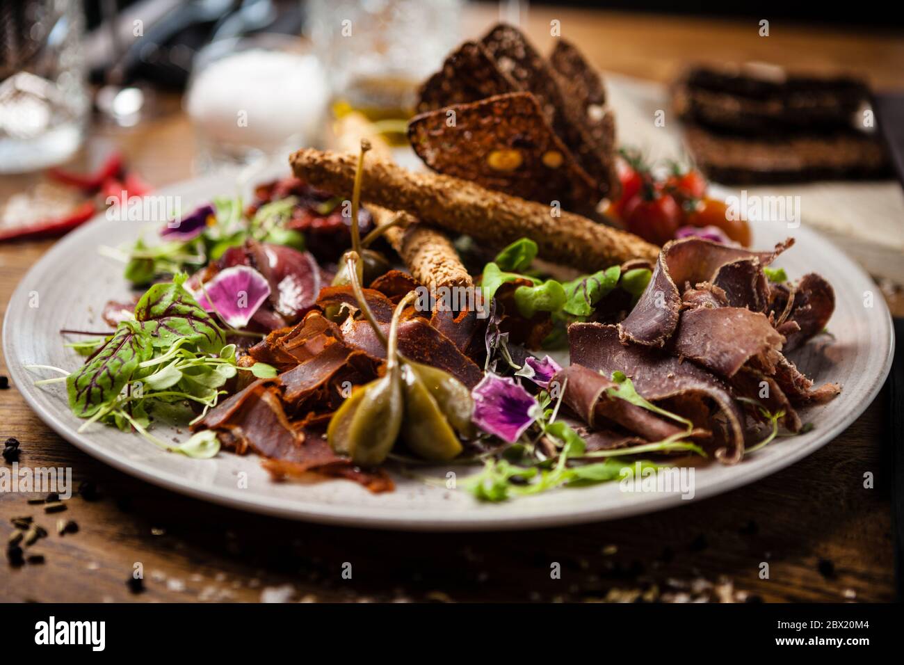 Meat platter for two: Dry-aged beef brisket, duck fillet, beef liver ...
