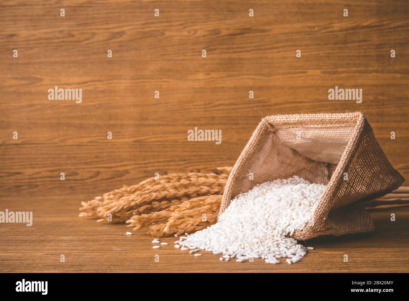 Rice in burlap sack hi-res stock photography and images - Alamy