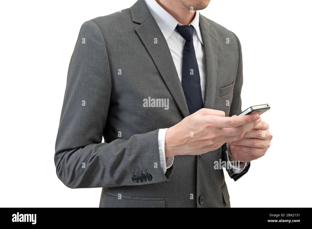 Businessman holding mobile phone isolated on white background Stock ...