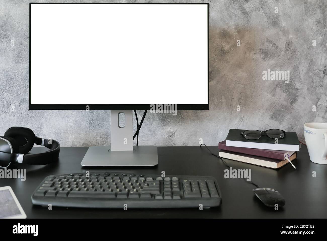 Computer with white screen monitor on the desk Stock Photo - Alamy