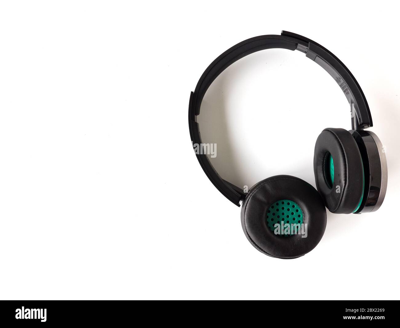 Headphones on a white background, Free space for text Stock Photo - Alamy
