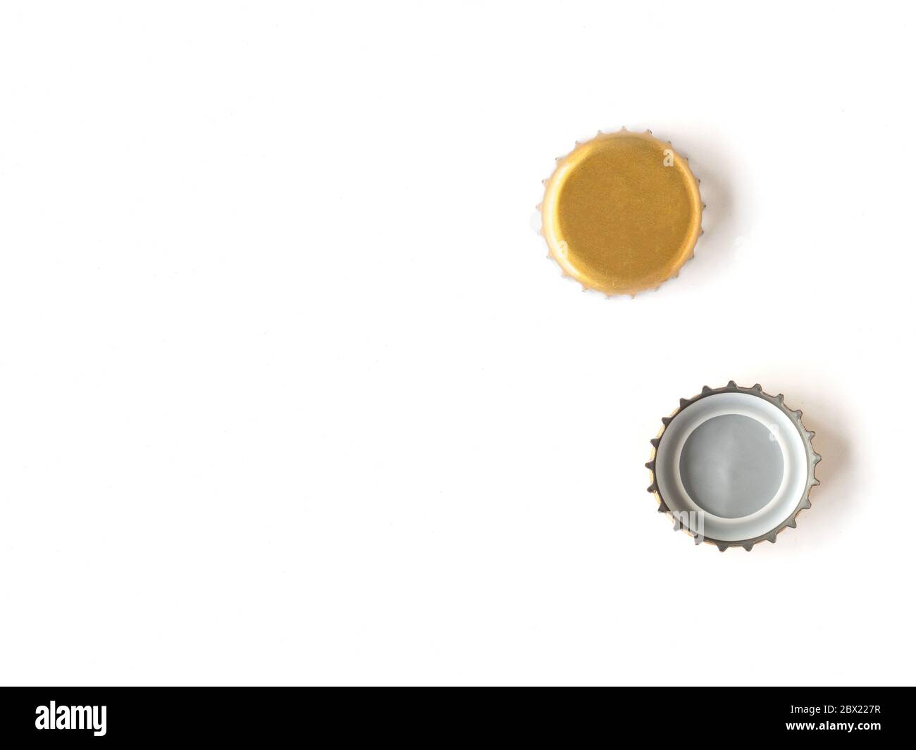 Bottle caps on a white background, Free space for text Stock Photo - Alamy