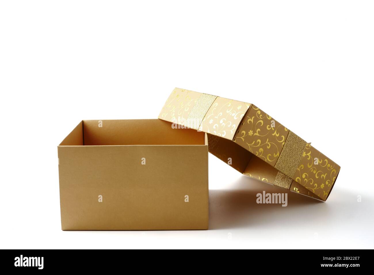 Open golden gift box hi-res stock photography and images - Alamy
