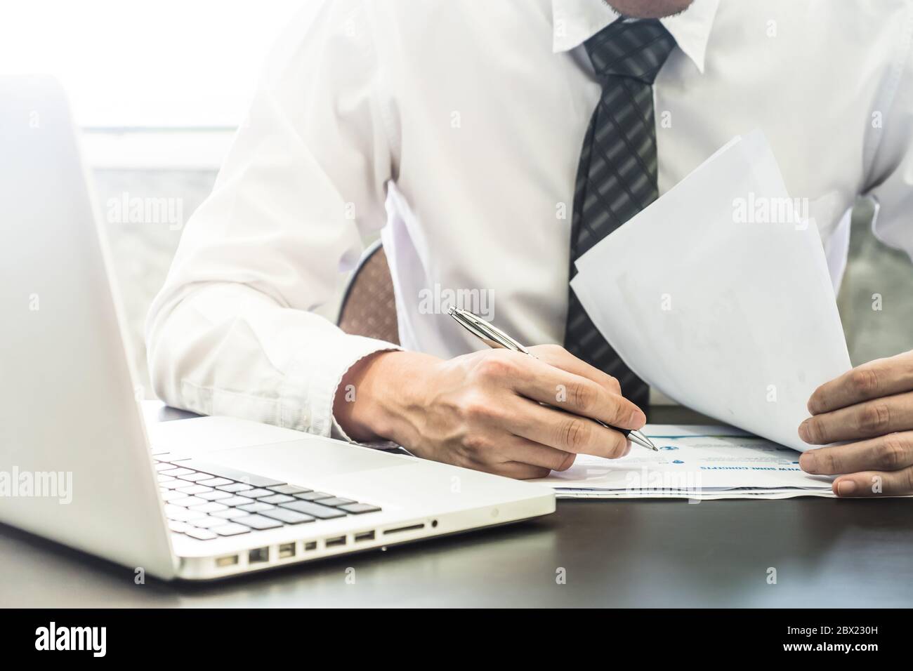 Checking electronic document hi-res stock photography and images - Alamy