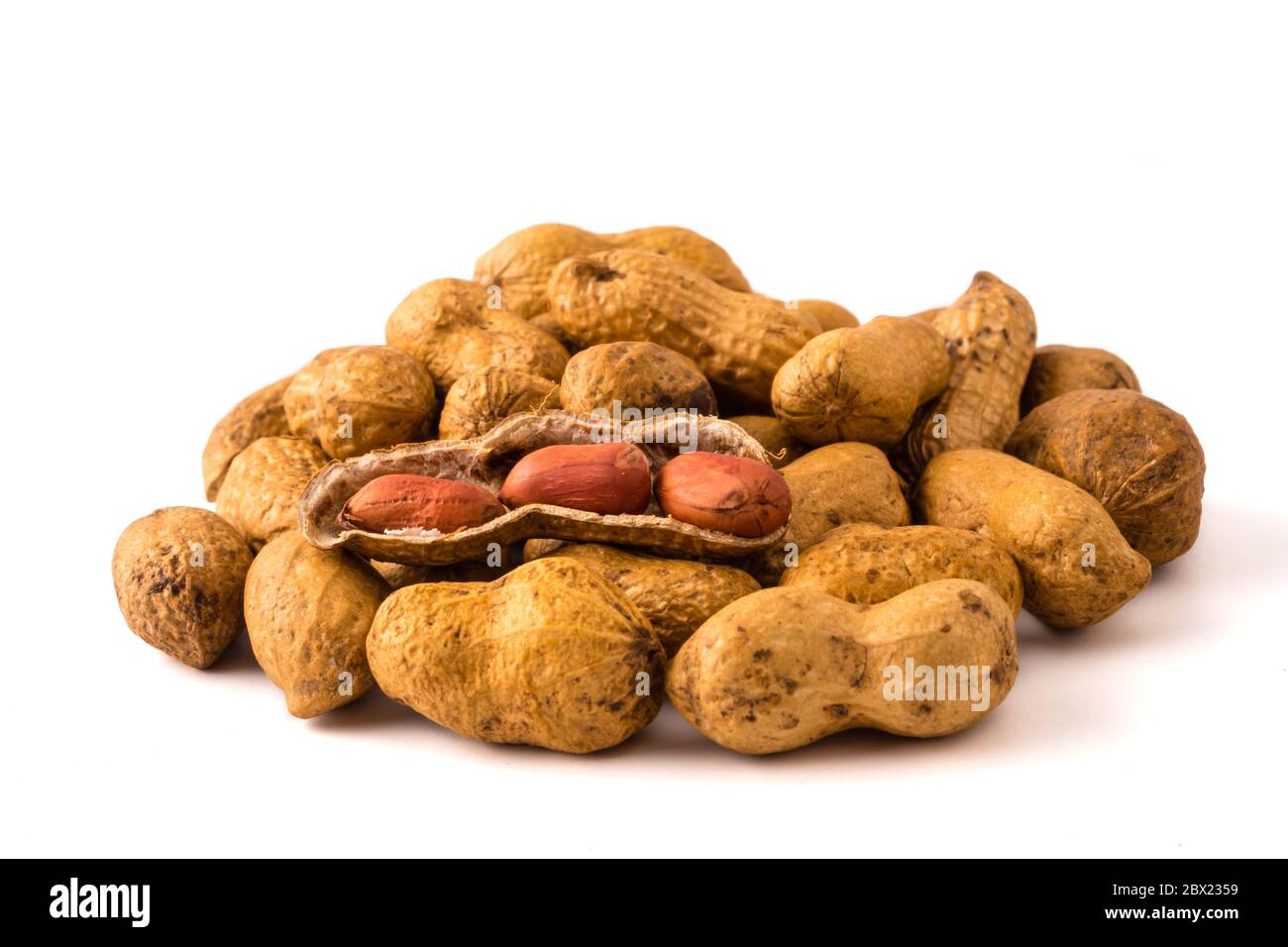Peanuts on white background Stock Photo - Alamy