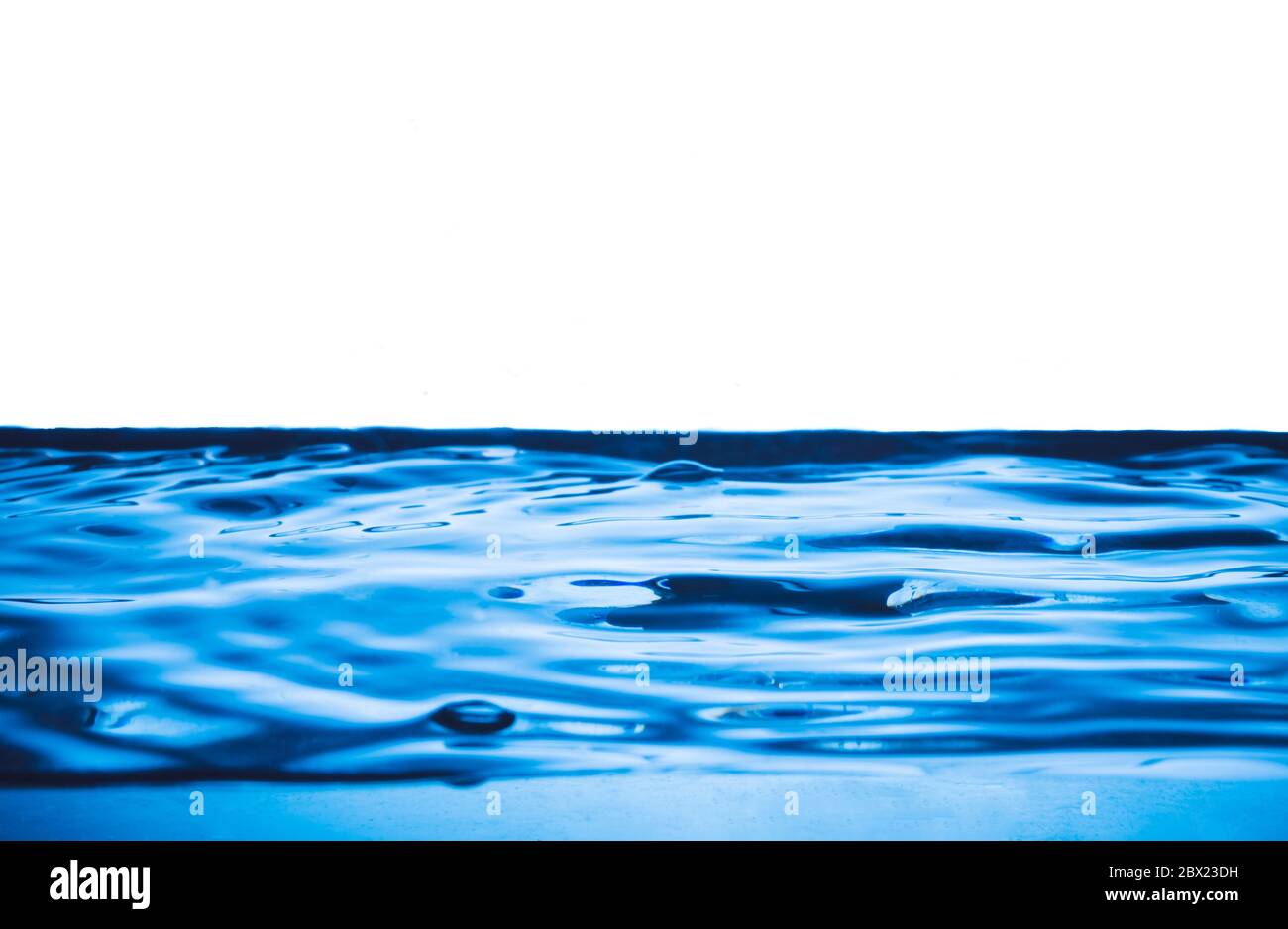Blue wave on water surface background Stock Photo - Alamy