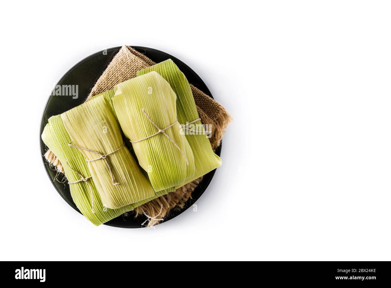 Mexican corn and chicken tamales isolated on white background. Top view ...