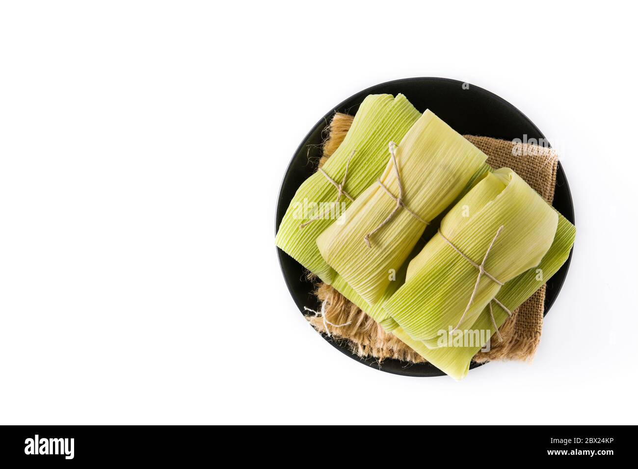 Mexican corn and chicken tamales isolated on white background. Top view ...