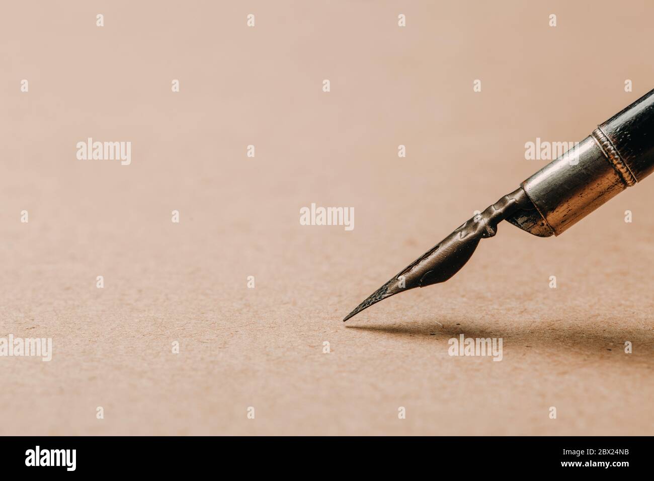 fountain pen on old paper. Vintage. toned photo Stock Photo - Alamy