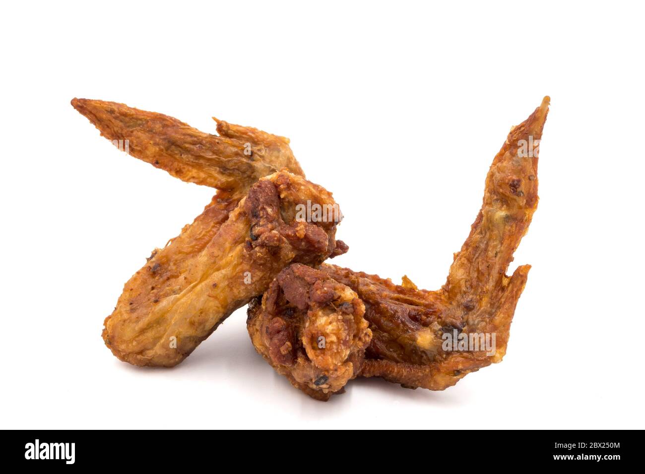 Fried chicken wings on a white background Stock Photo - Alamy