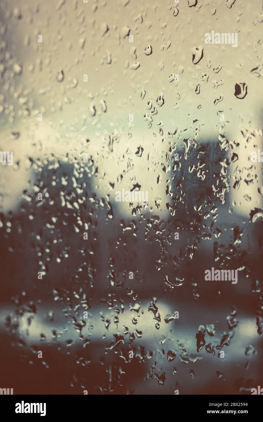 Raindrops on the glass window.vintage tone Stock Photo - Alamy