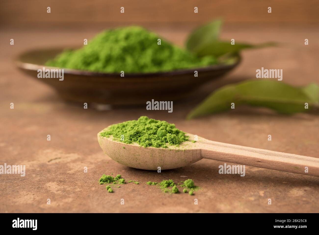 Spoon of green tea powder up close hi-res stock photography and images ...