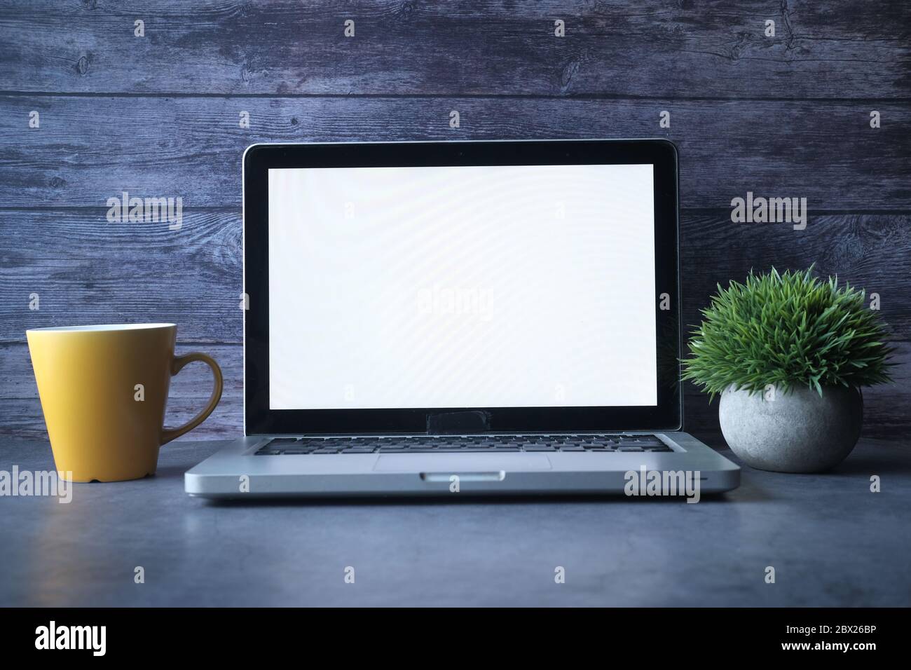 laptop with white screen on office table Stock Photo - Alamy
