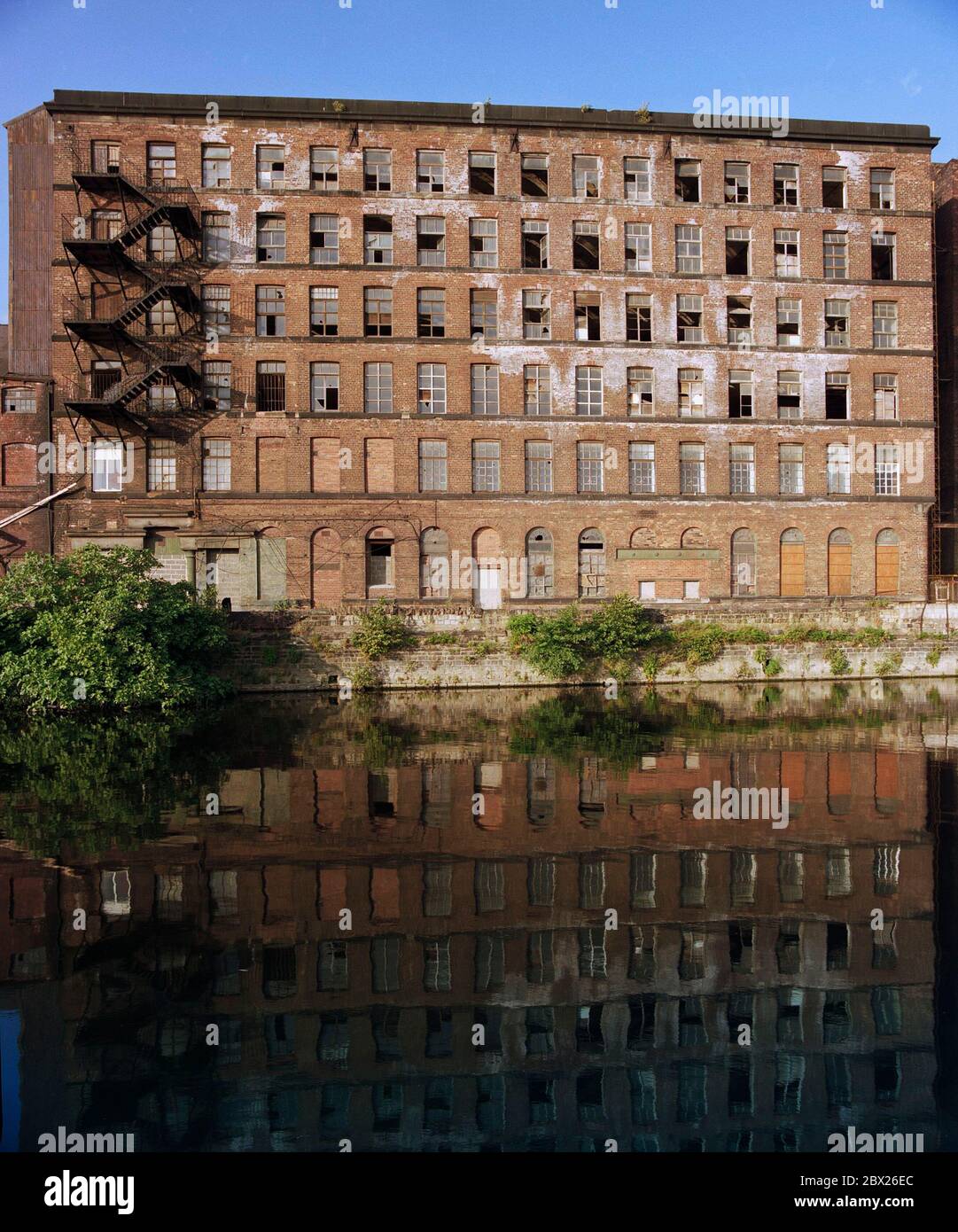 1995, Rose Wharf, a derelict old mill building next to the river Aire ...
