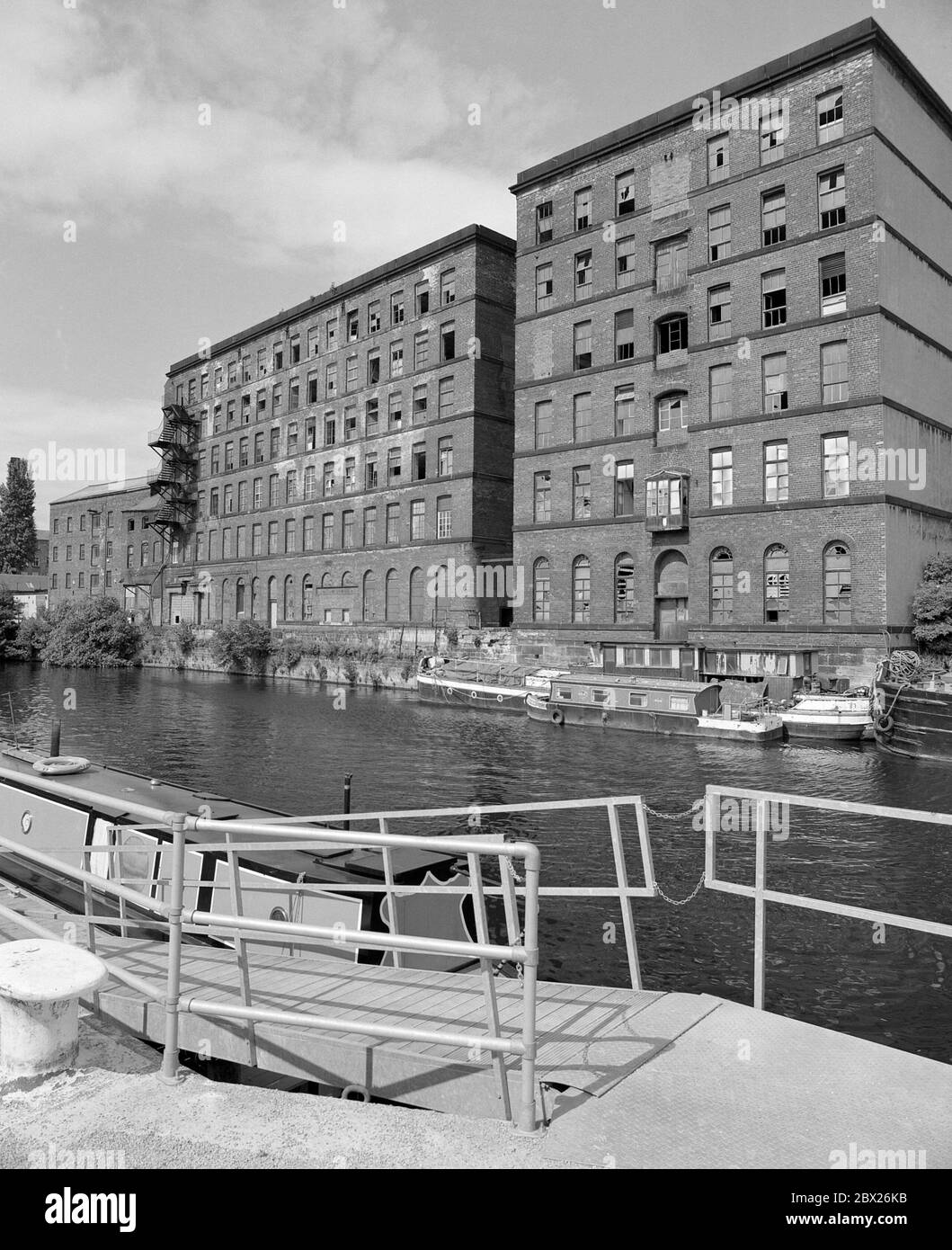 1995, Rose Wharf, a derelict old mill building next to the river Aire ...