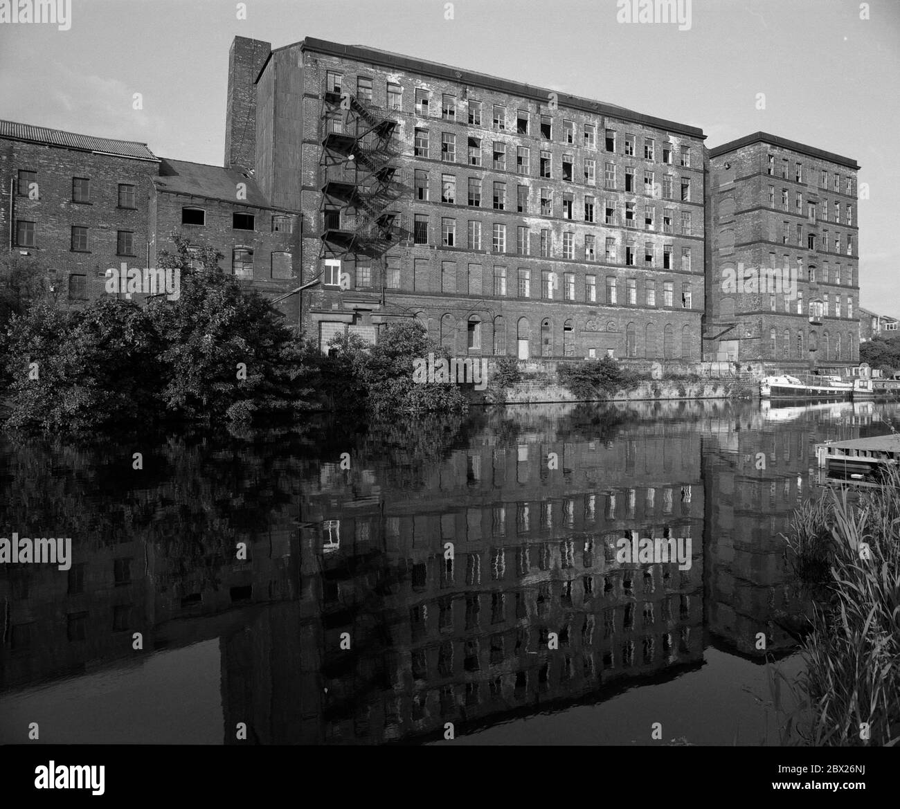 Yorkshire mill next to river Black and White Stock Photos & Images - Alamy