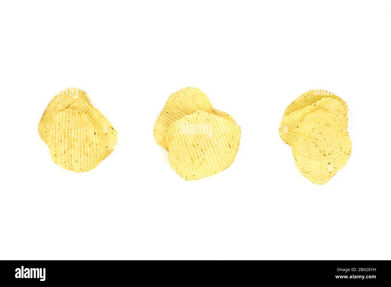 yellow potato chips isolated on white background Stock Photo - Alamy