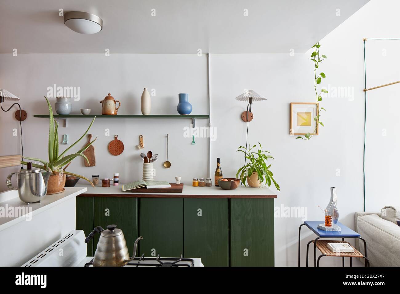 Kitchen pantry in eclectic home office studio Stock Photo - Alamy