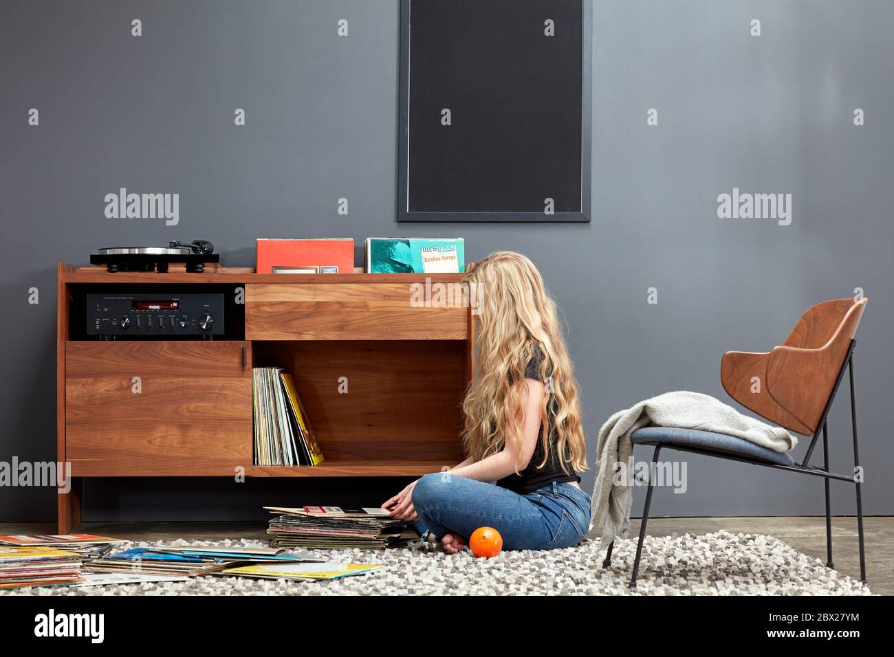 Woman sorting vinyl records in custom cabinet Stock Photo - Alamy Woman sorting vinyl records in custom cabinet Stock Photo - Alamy