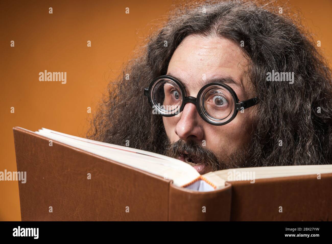 Nerd reading hi-res stock photography and images - Alamy