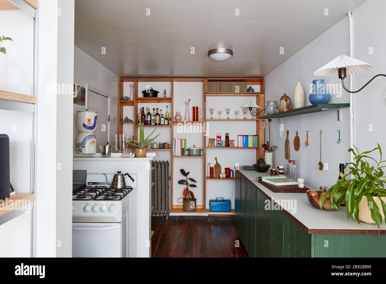 Loft Kitchen interior with counter space and shelving, props Stock ...