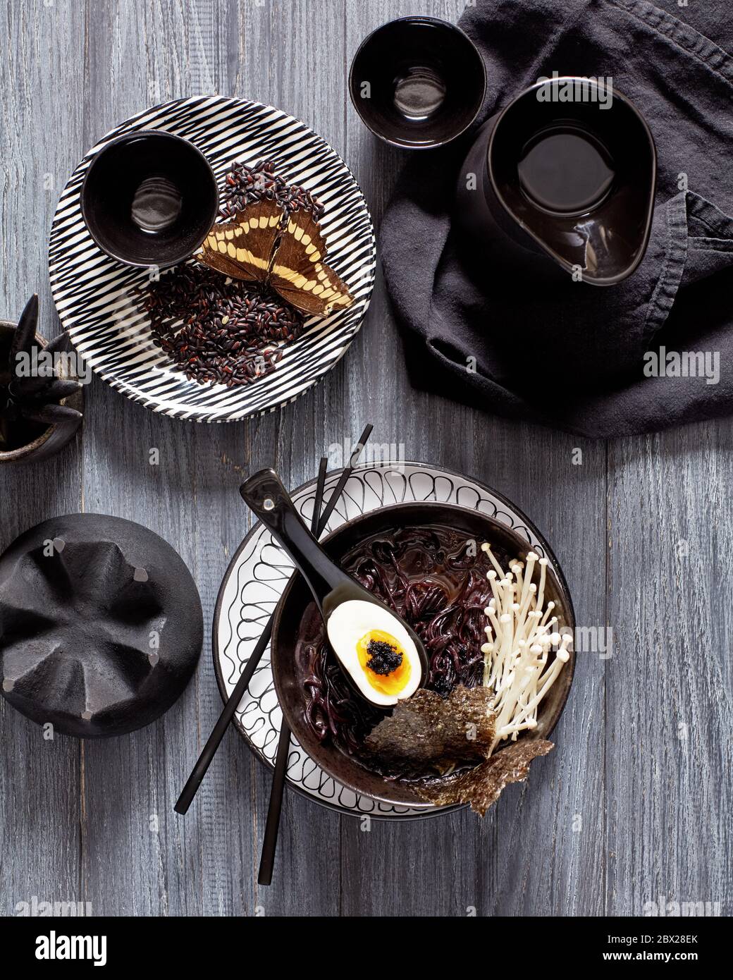 Still life of Ramen noodles and grey-toned props Stock Photo - Alamy