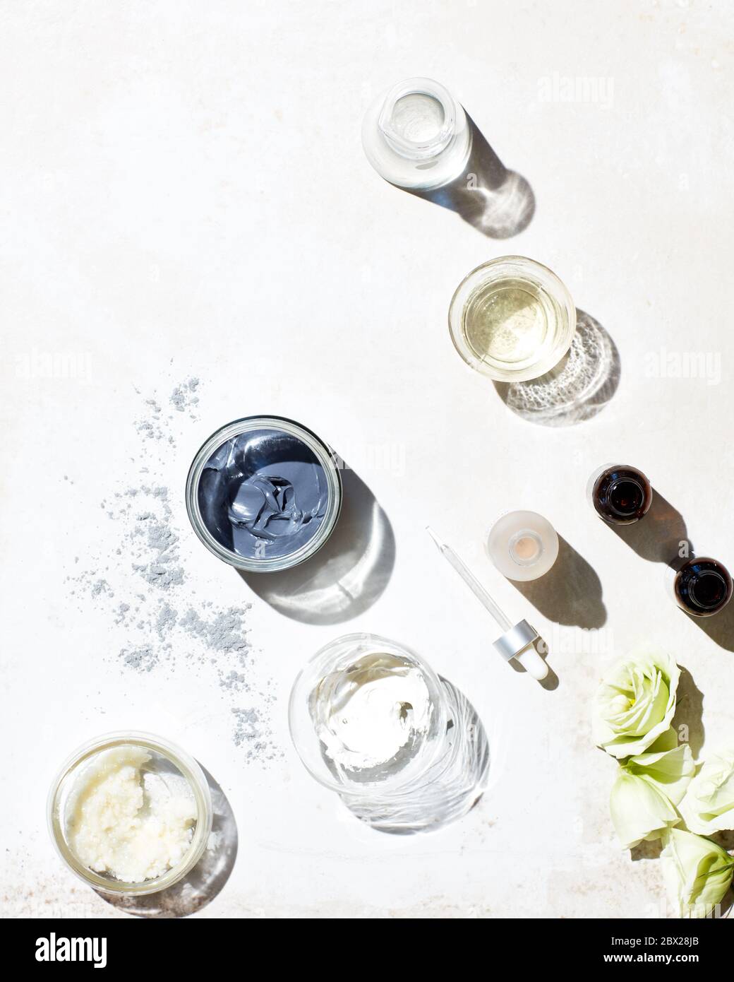 Still life of skincare products textured surface Stock Photo - Alamy