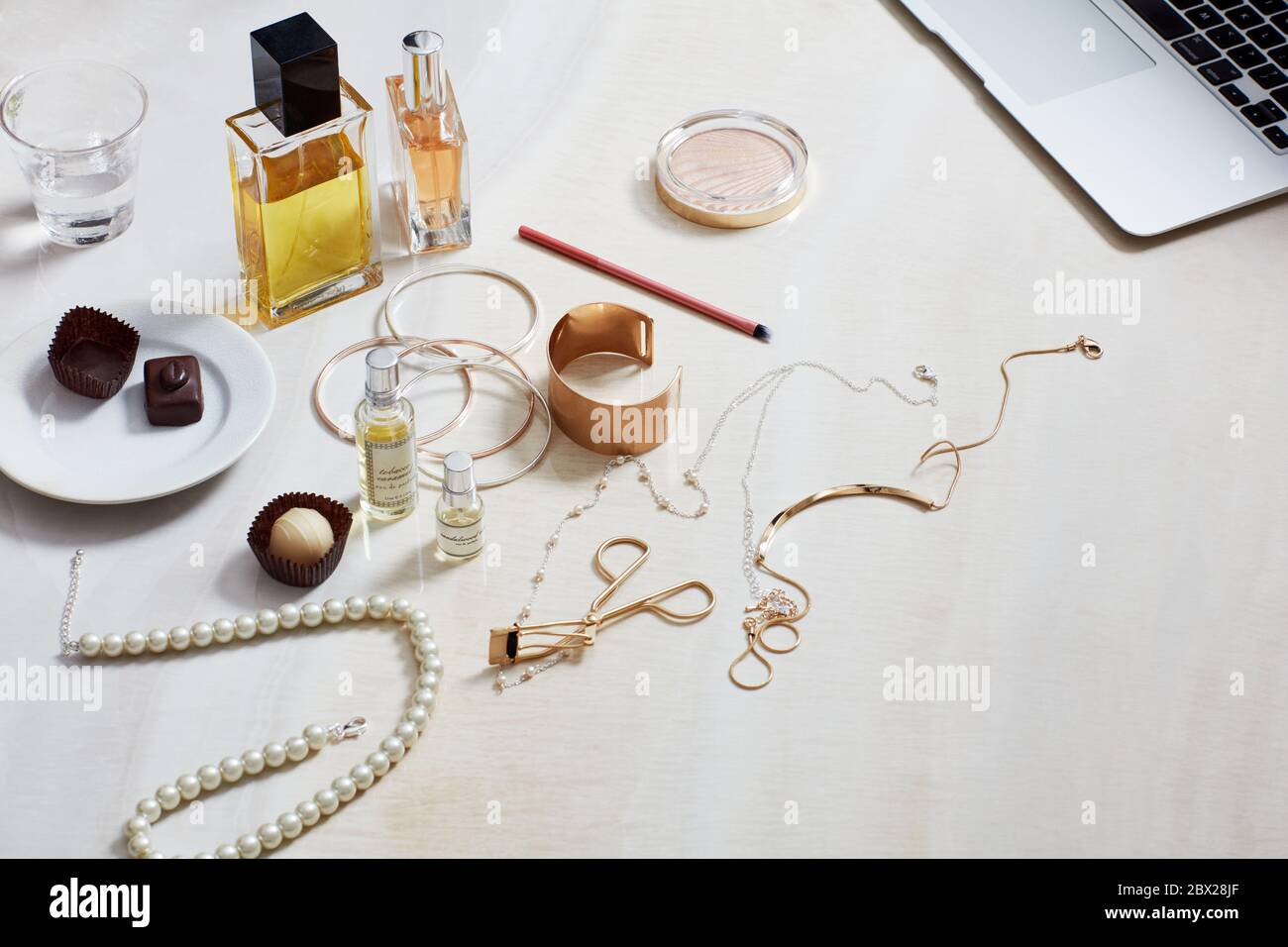 Perfume, beauty products, perfume, chocolates, laptop computer Stock ...