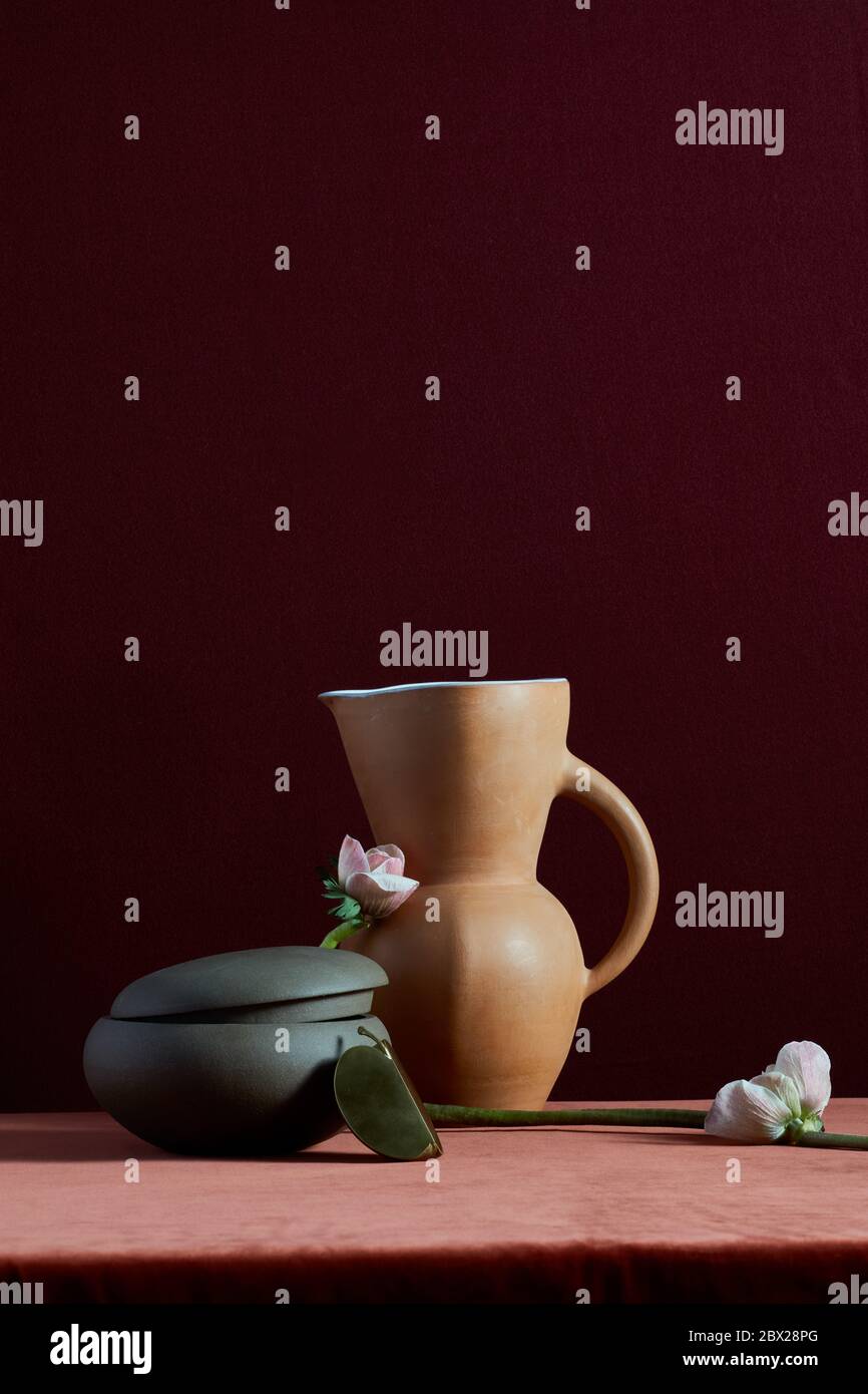 Still life of pottery jug and jar with lid Stock Photo - Alamy