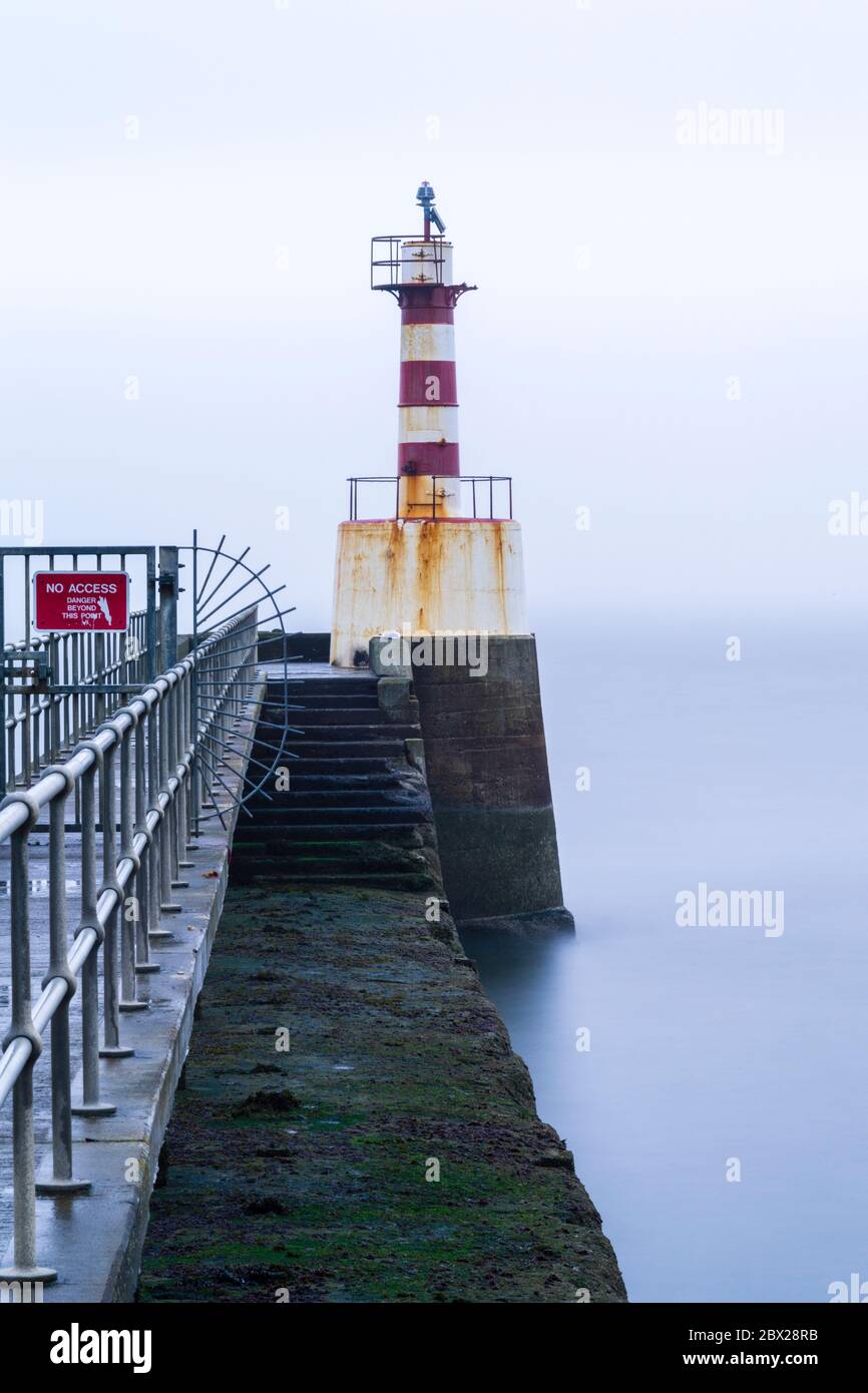 Amble pier in mist hi-res stock photography and images - Alamy