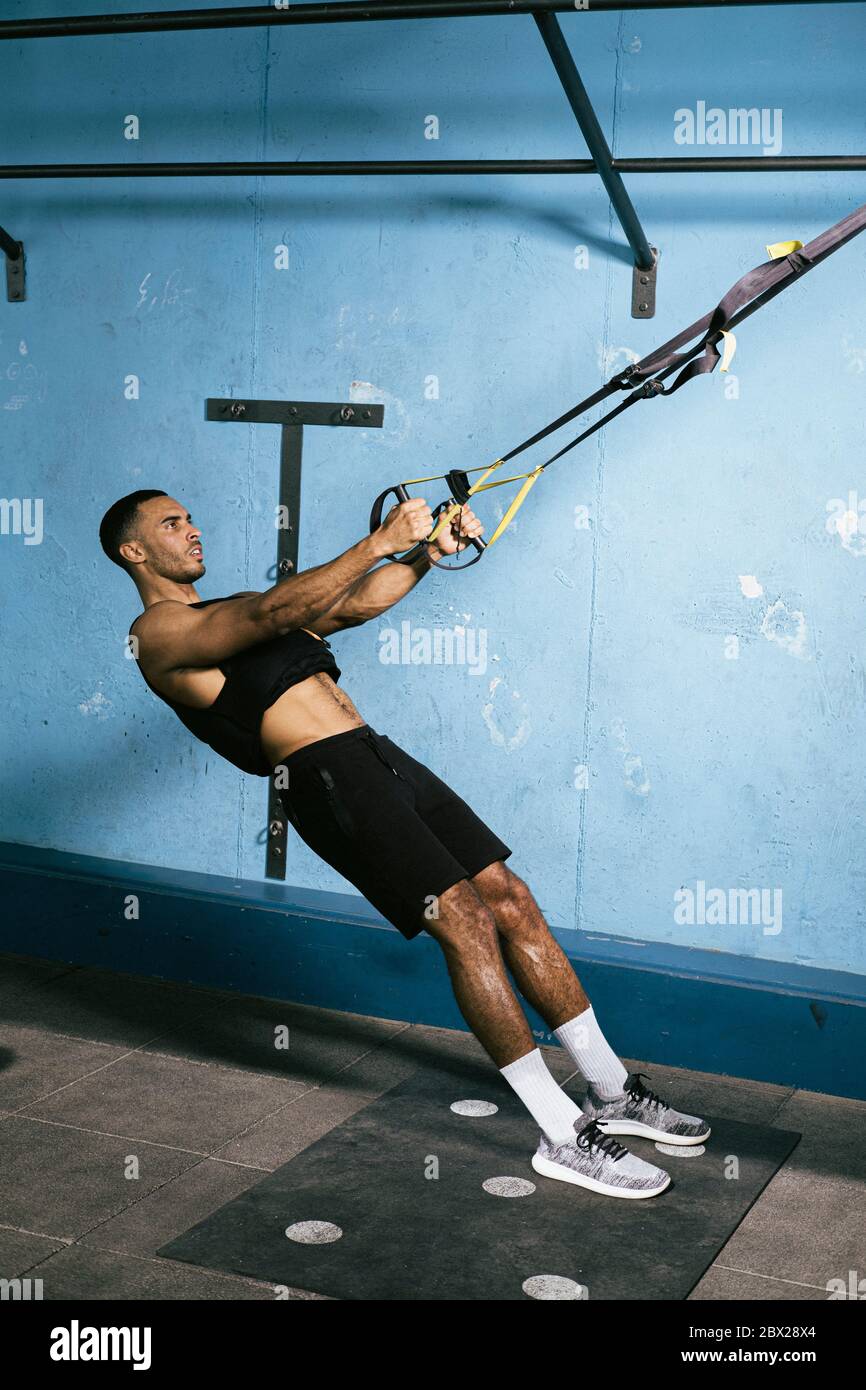 African American male athlete exercising in the gym Stock Photo - Alamy