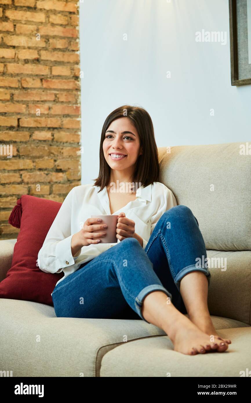 Caucasian young woman relaxing in hi-res stock photography and images ...